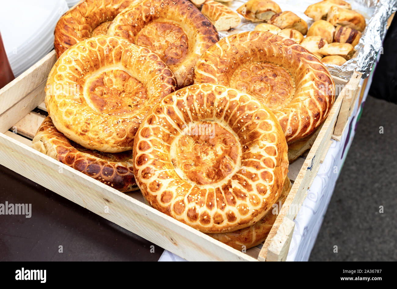 Traditional appetizing uzbek flat breads with sesame seeds from the ...