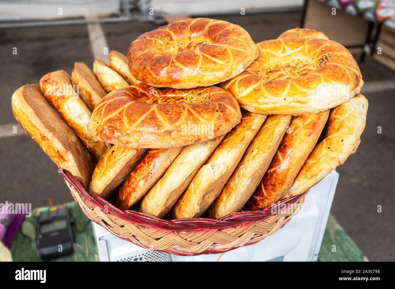 Traditional appetizing uzbek flat breads with sesame seeds from the ...