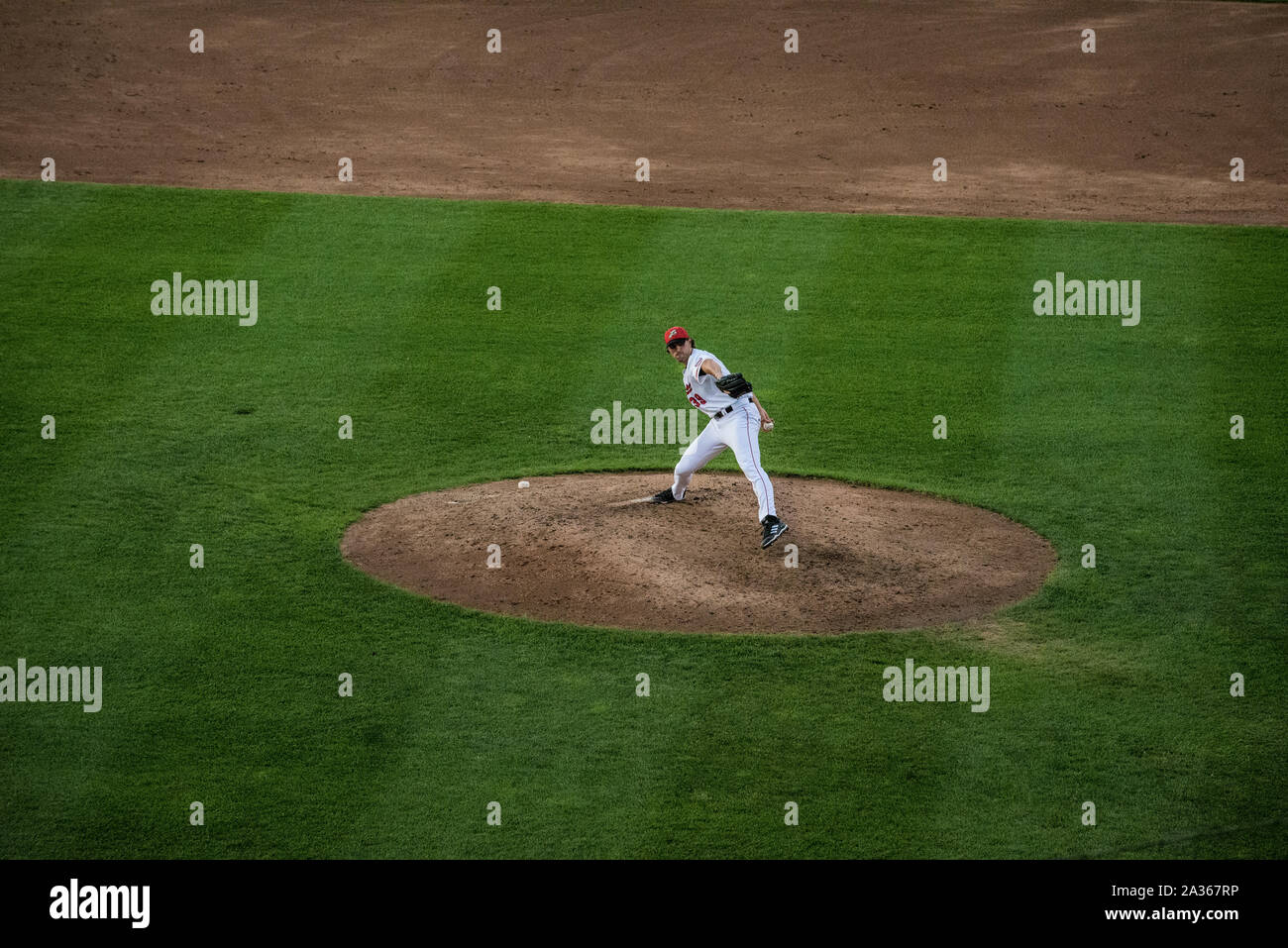 Professional minor league baseball park and players Stock Photo - Alamy