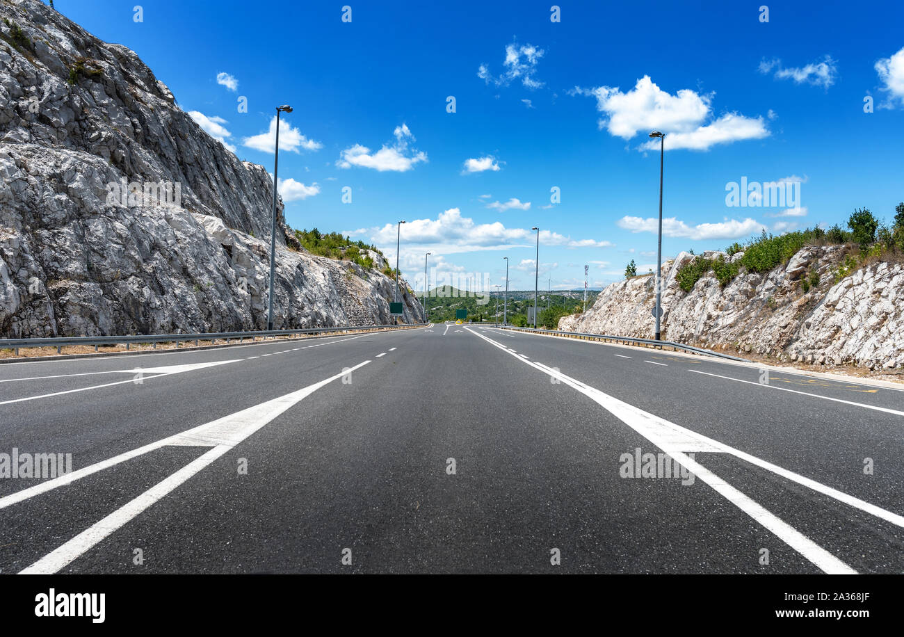 High-speed highway in mountainous terrain Stock Photo - Alamy