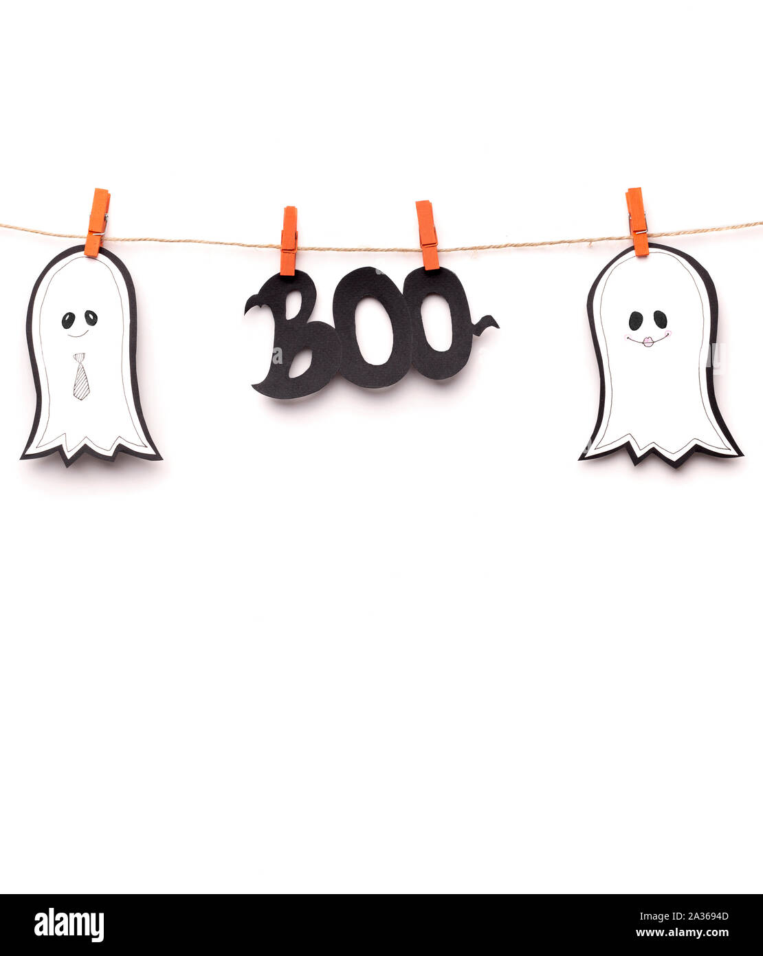 Halloween silhouettes hanging on rope as decorations Stock Photo - Alamy