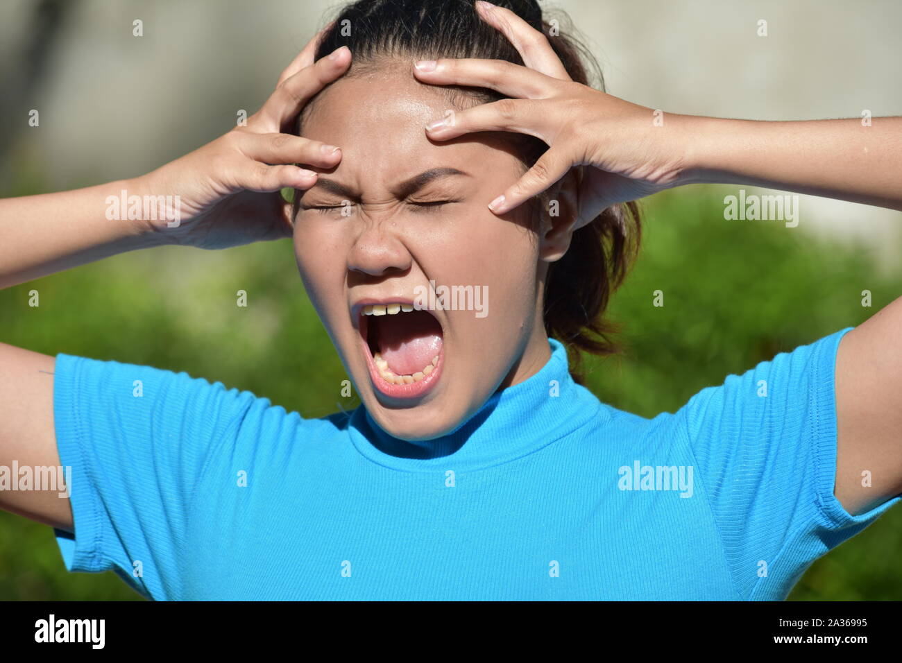 An A Stressed Asian Person Stock Photo - Alamy