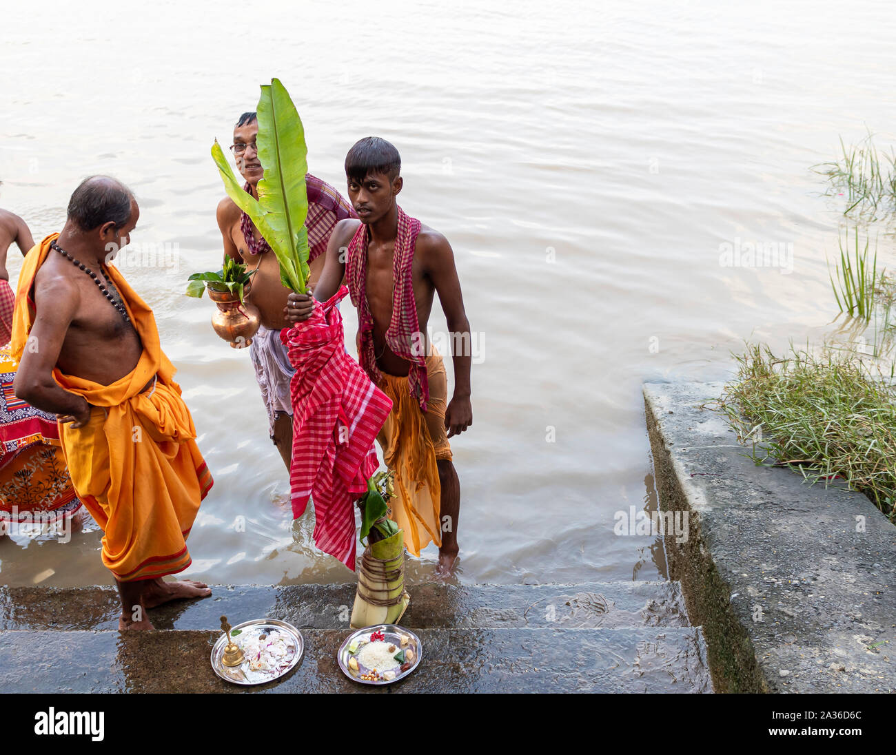 Kolkata, India. 05th Oct, 2019. Priest performing rituals with a Banana ...