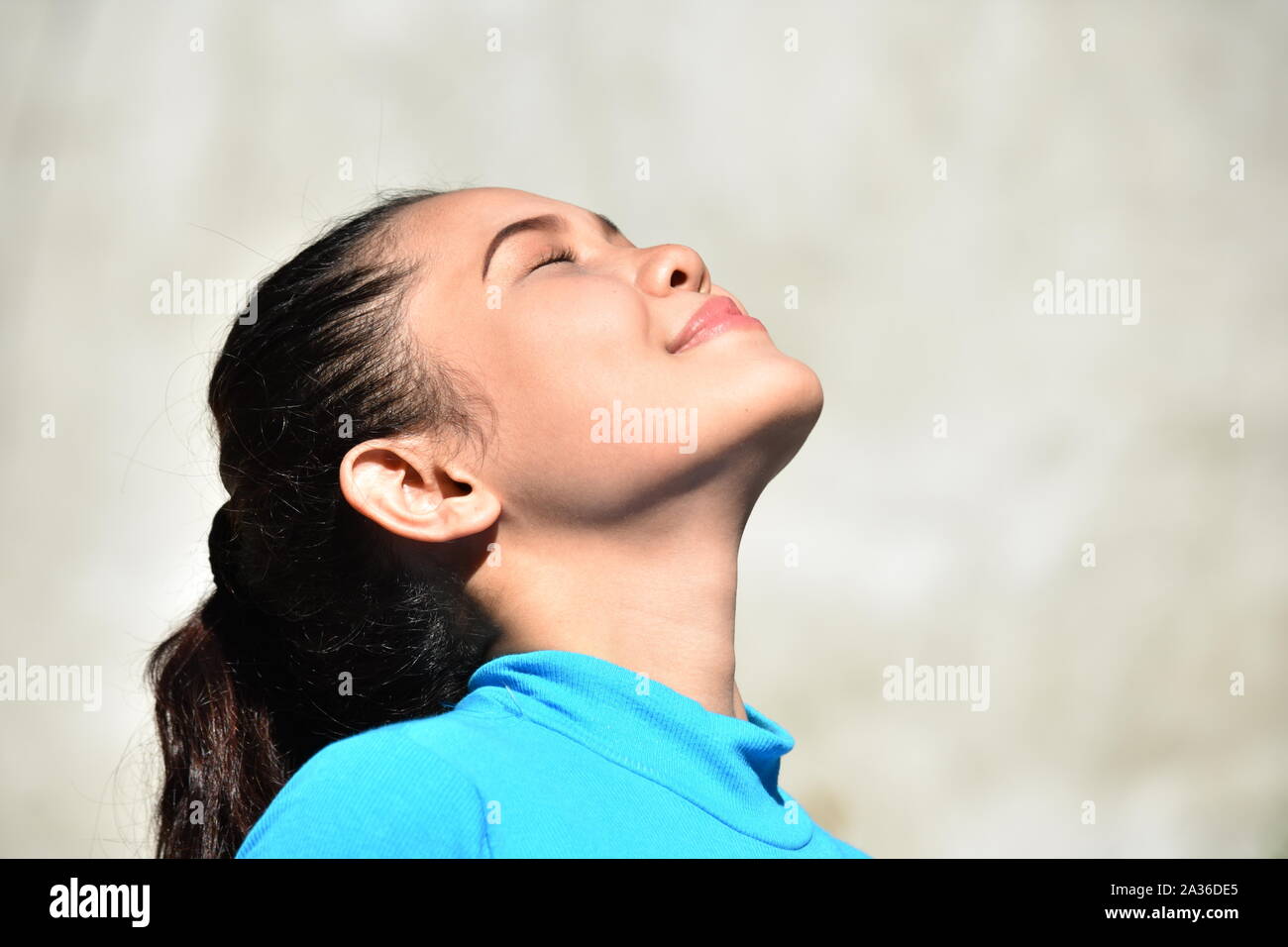 An A Contemplative Young Female Stock Photo - Alamy