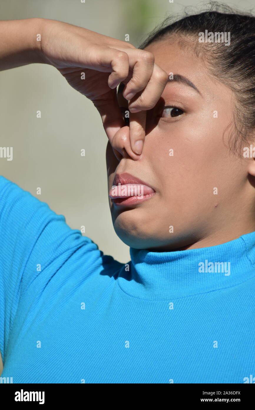 A Pretty Woman And Smell Stock Photo - Alamy