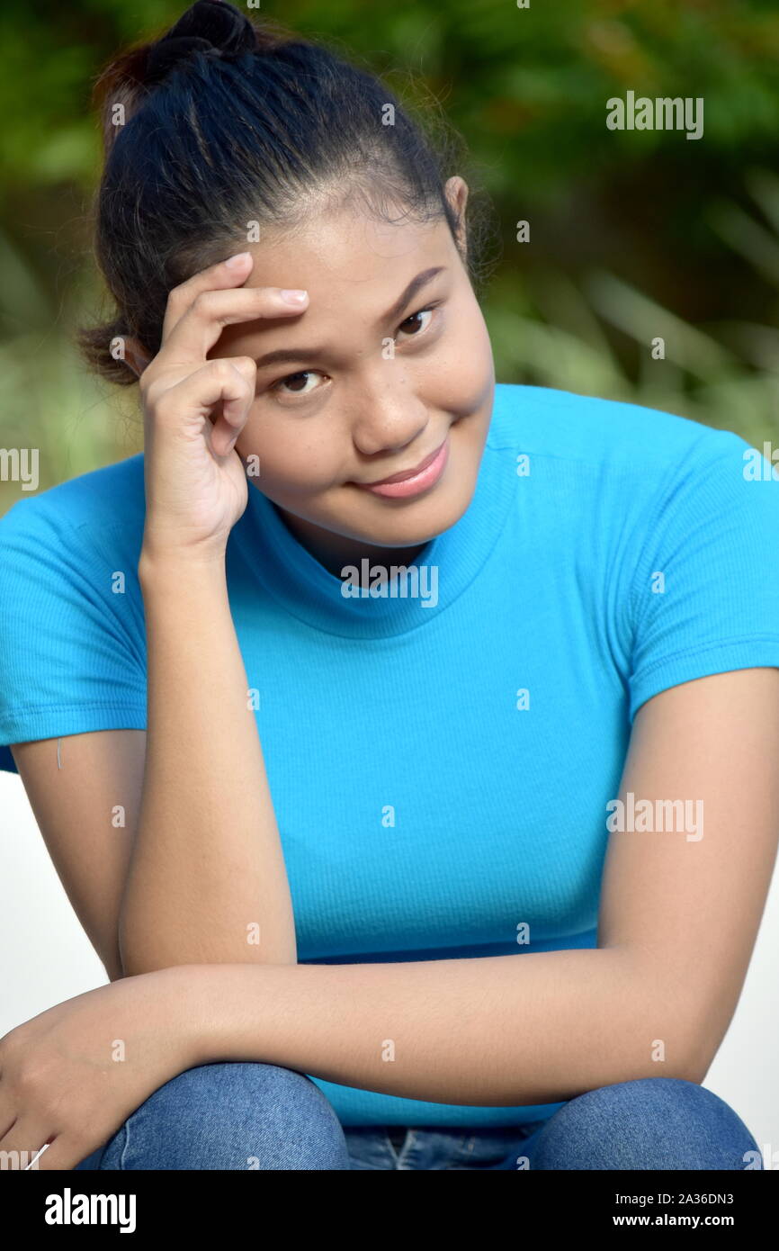 An A Filipina Female Thinking Stock Photo - Alamy