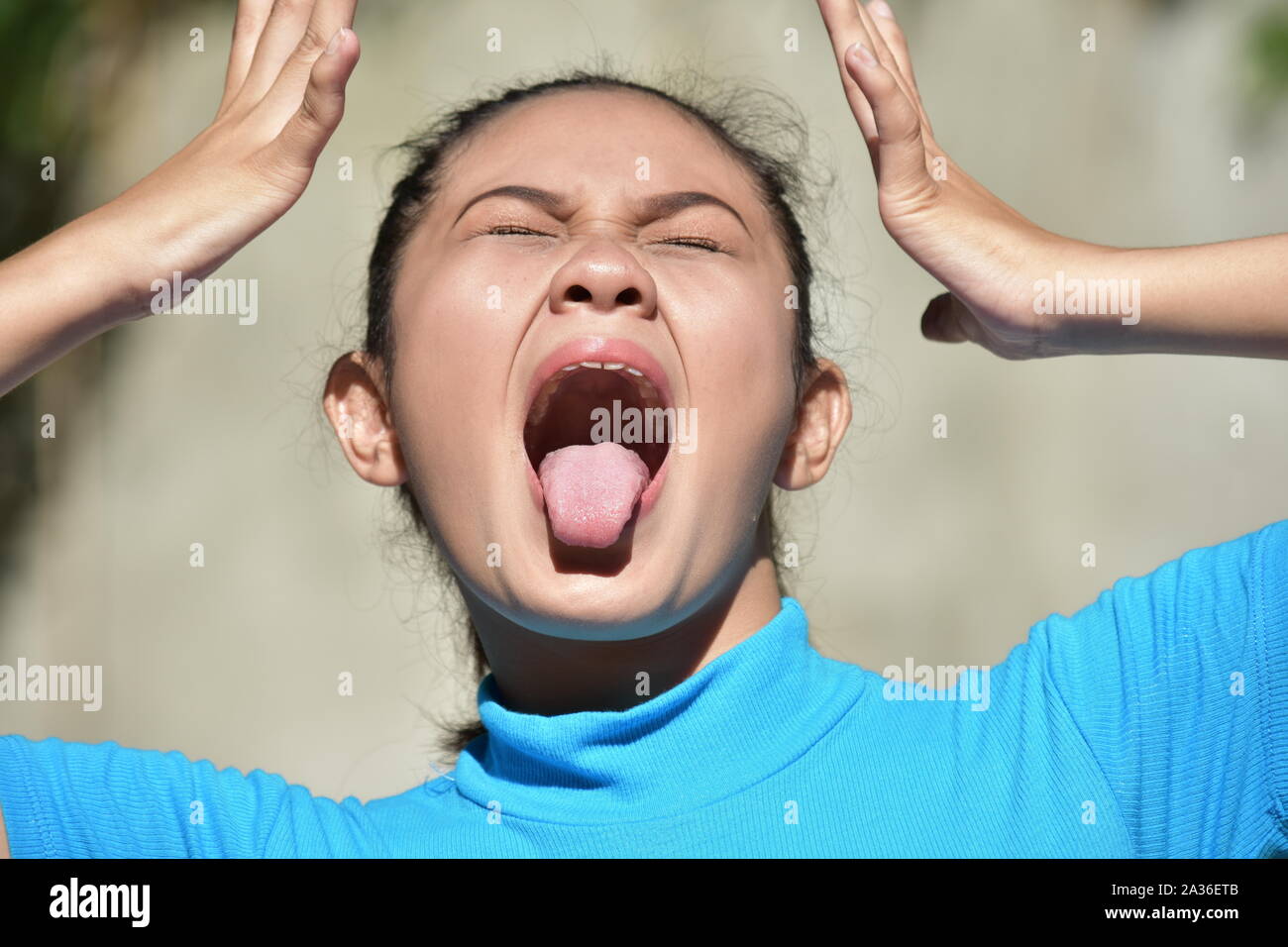An An Anxious Asian Female Stock Photo - Alamy