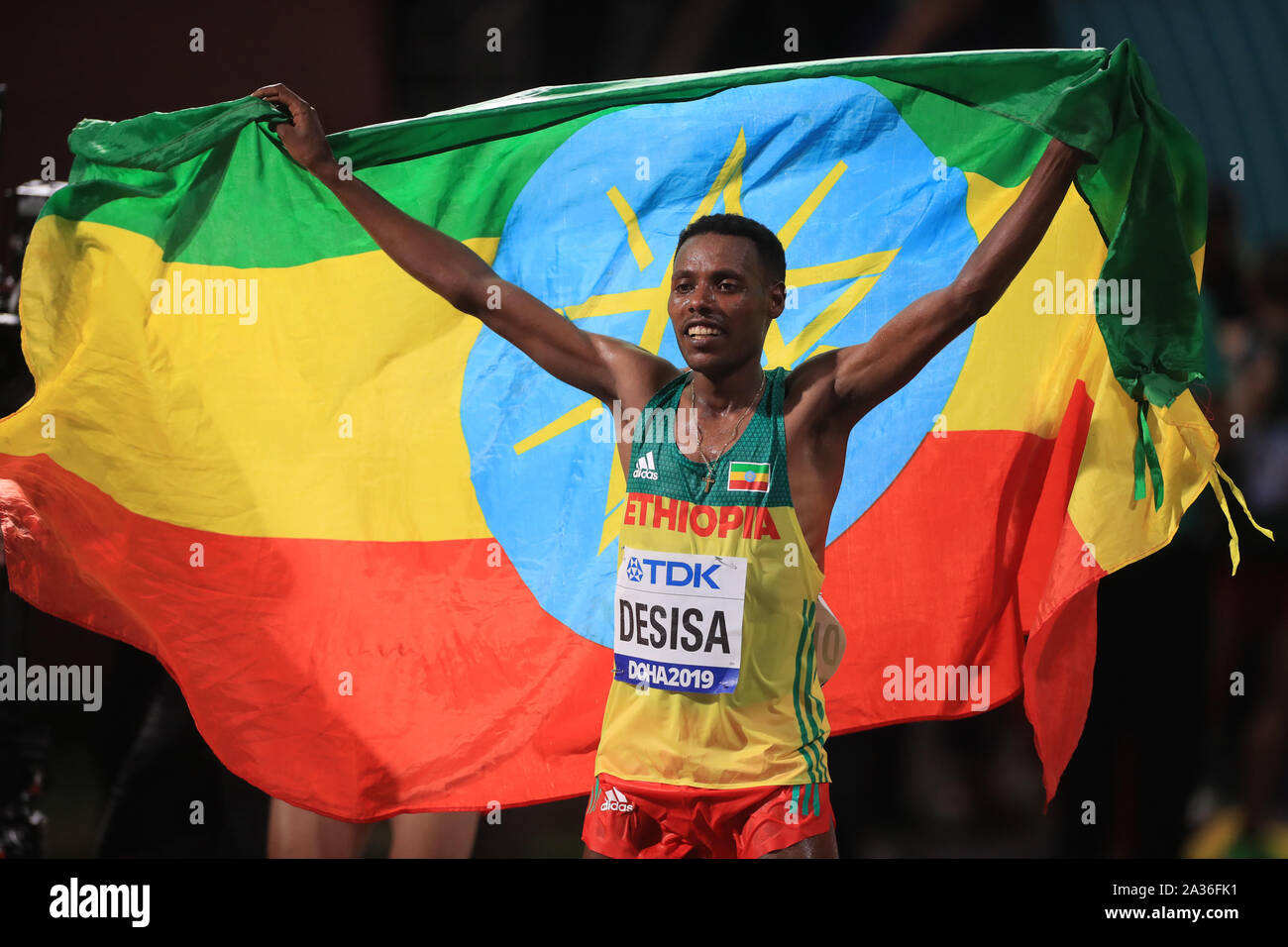 Ethiopia's Lelisa Desisa celebrates winning the mens marathon during ...