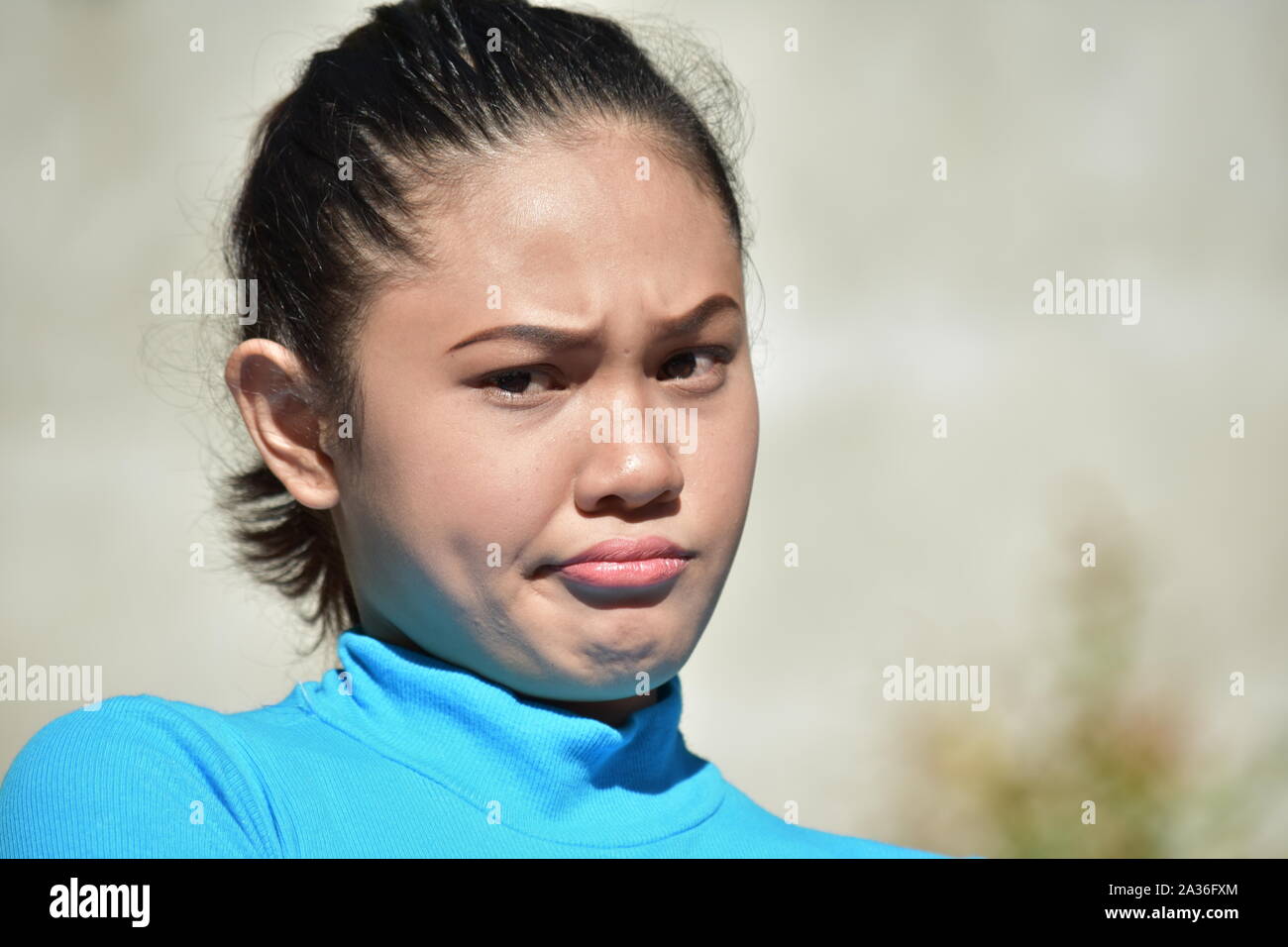 A Confused Pretty Asian Female Woman Stock Photo - Alamy