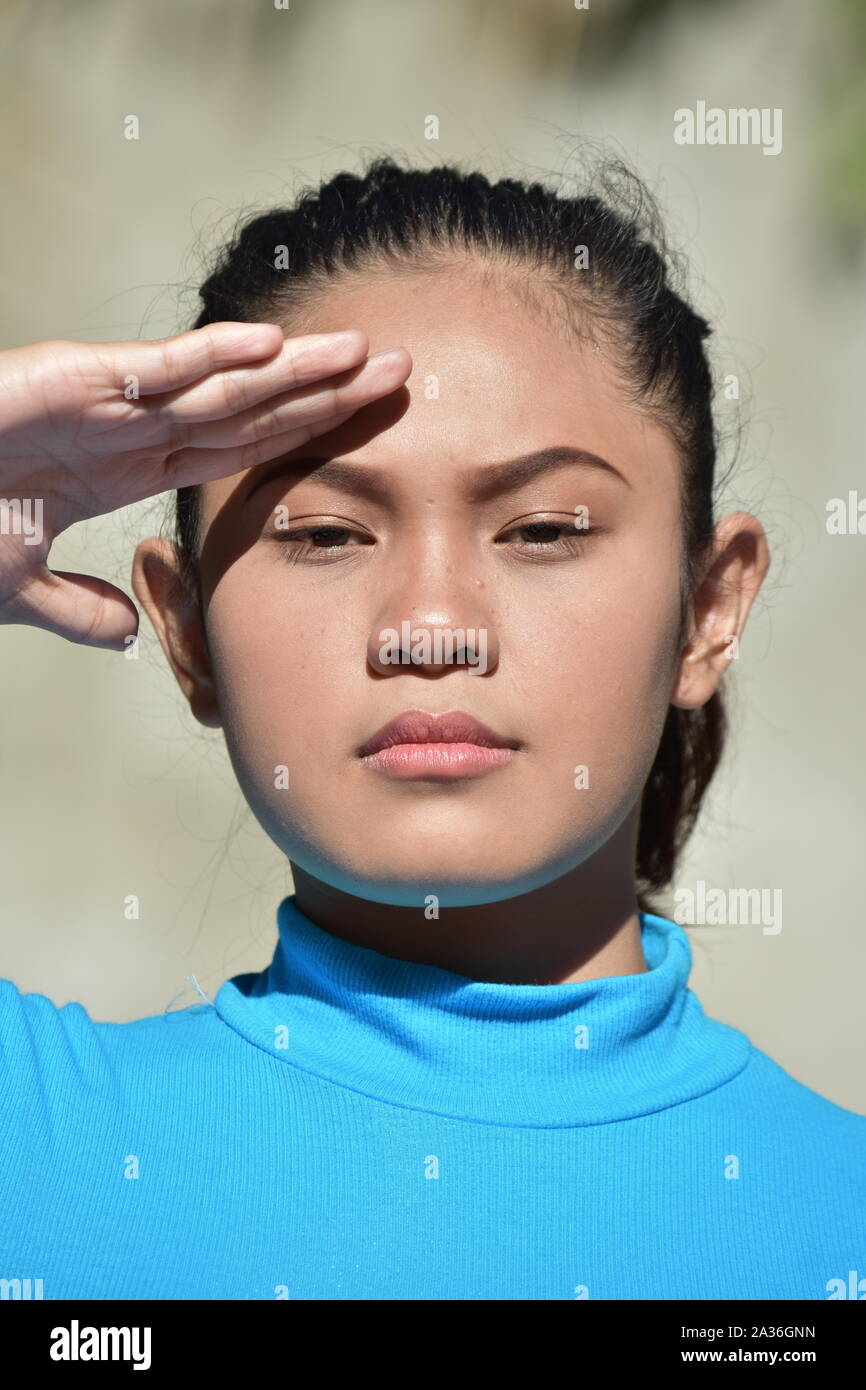 An A Diverse Female Saluting Stock Photo - Alamy