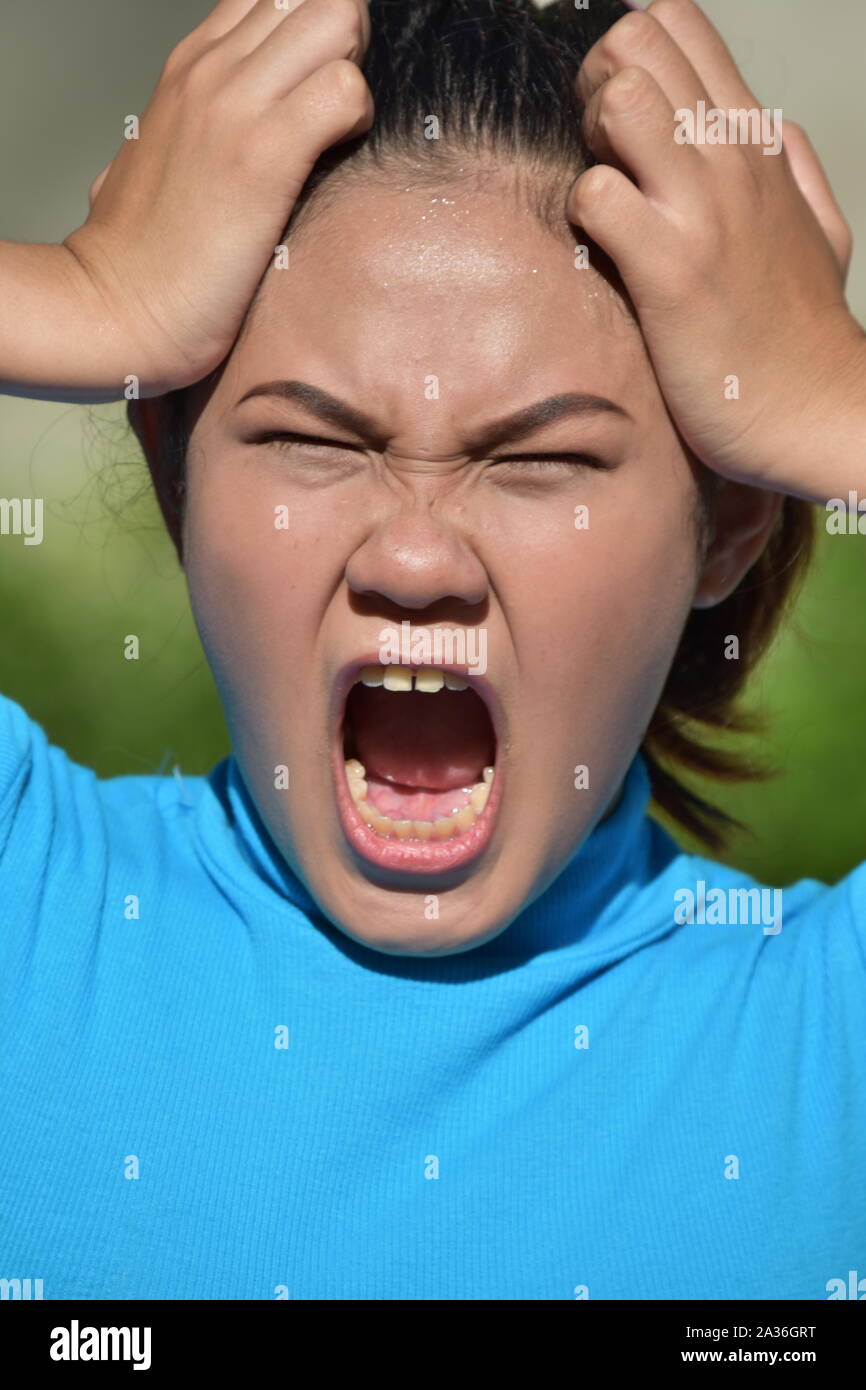 A Filipina Female And Anxiety Stock Photo - Alamy