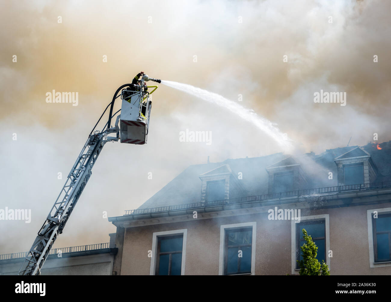 Fire brigade in action Stock Photo - Alamy