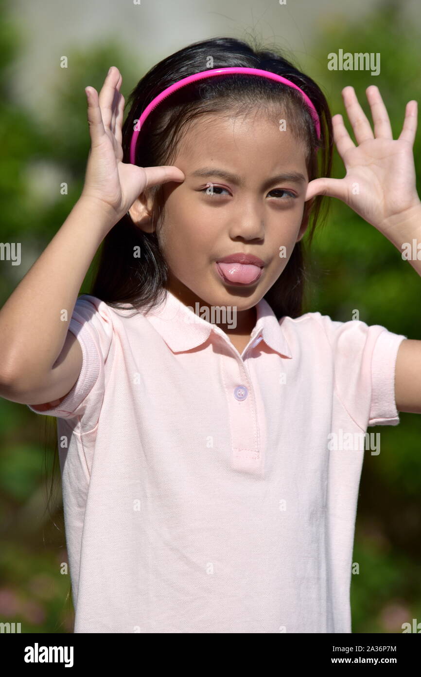 A Tween Making Funny Faces Stock Photo - Alamy