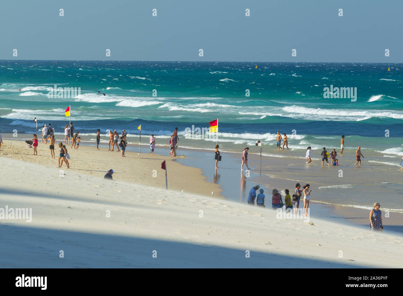 Crowds on the beach at Surfers Paradise on the Gold Coast in Queensland ...