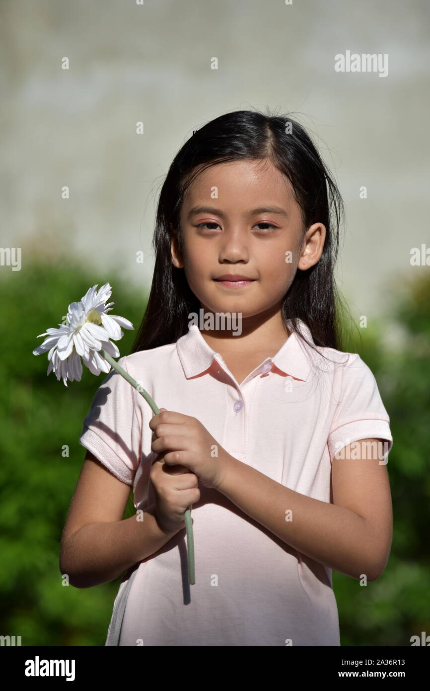 Adorable Cute Filipina Person With Flowers Stock Photo - Alamy