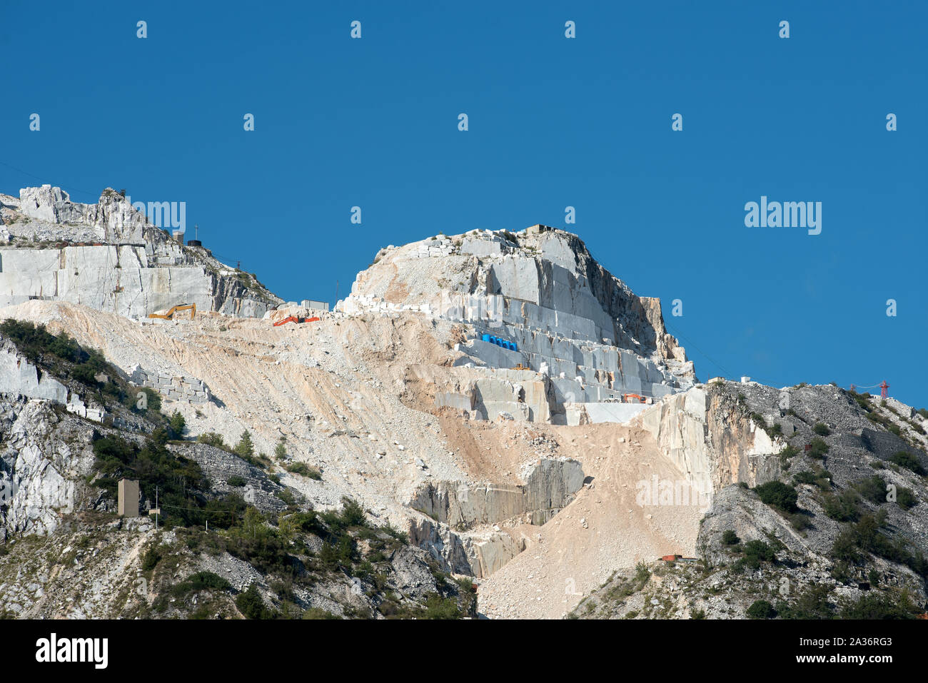 View of an open cast Carrara marble mine or cave in Colonnata, Italy ...