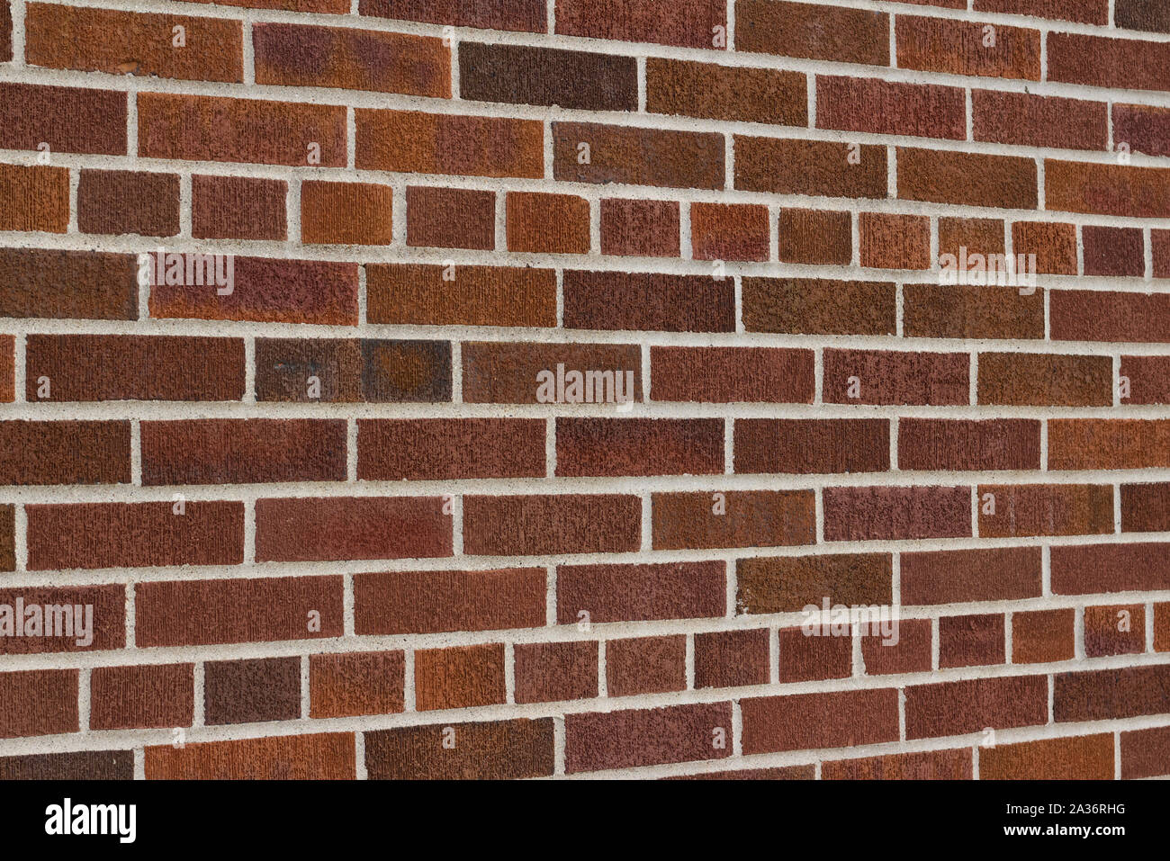 Vintage dark red clay brick wall texture background with common bond ...