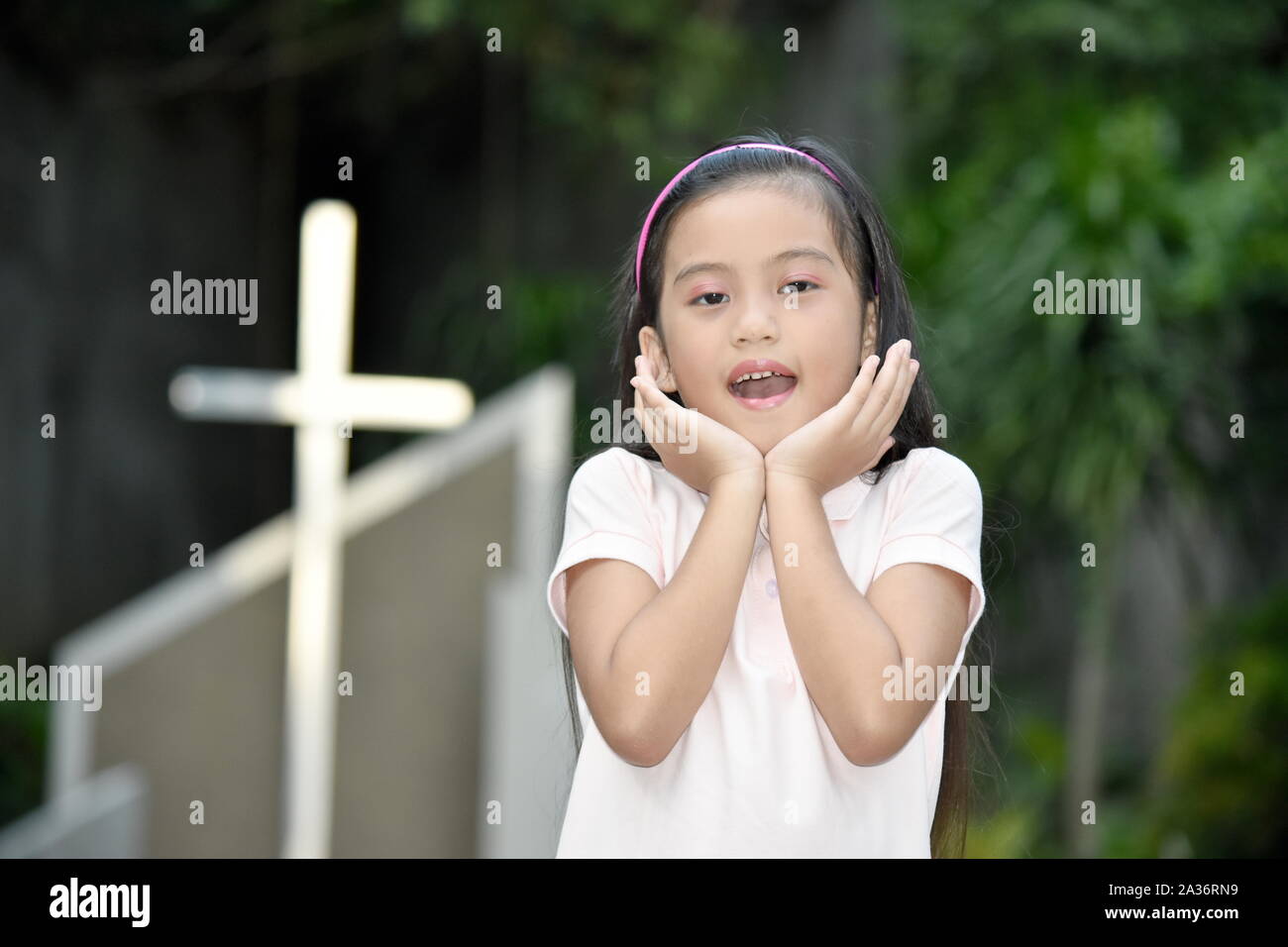 Surprised Religious Minority Person And Cross Stock Photo - Alamy