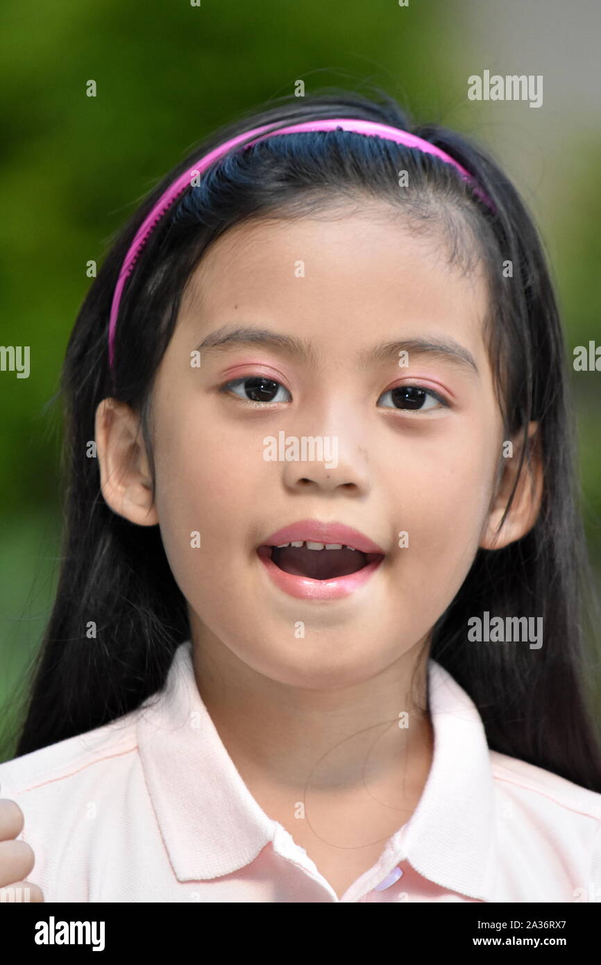 A Beautiful Filipina Child And Happiness Stock Photo - Alamy