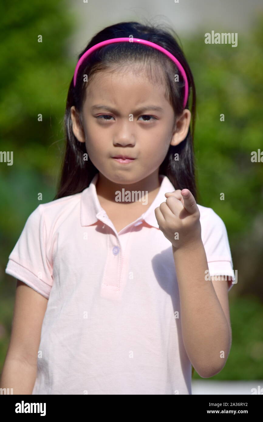 An Angry Young Asian Juvenile Stock Photo - Alamy