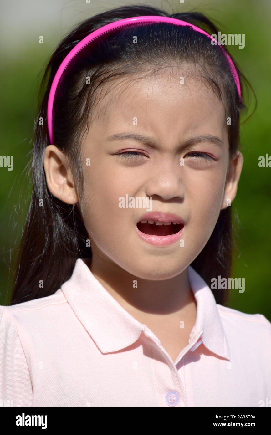 An Anxious Cute Diverse Person Stock Photo - Alamy