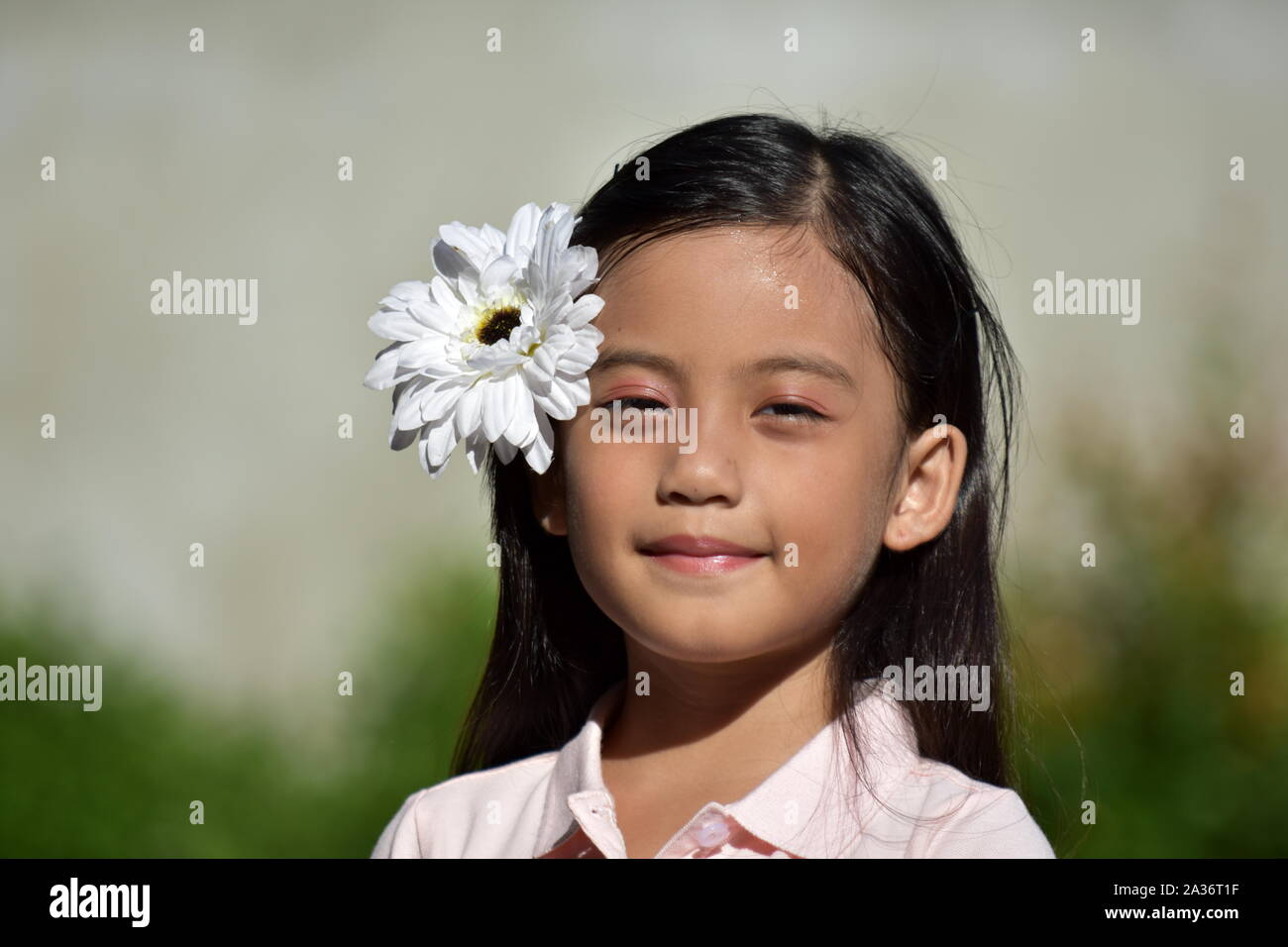 Pretty Cute Asian Person With Flower Stock Photo - Alamy