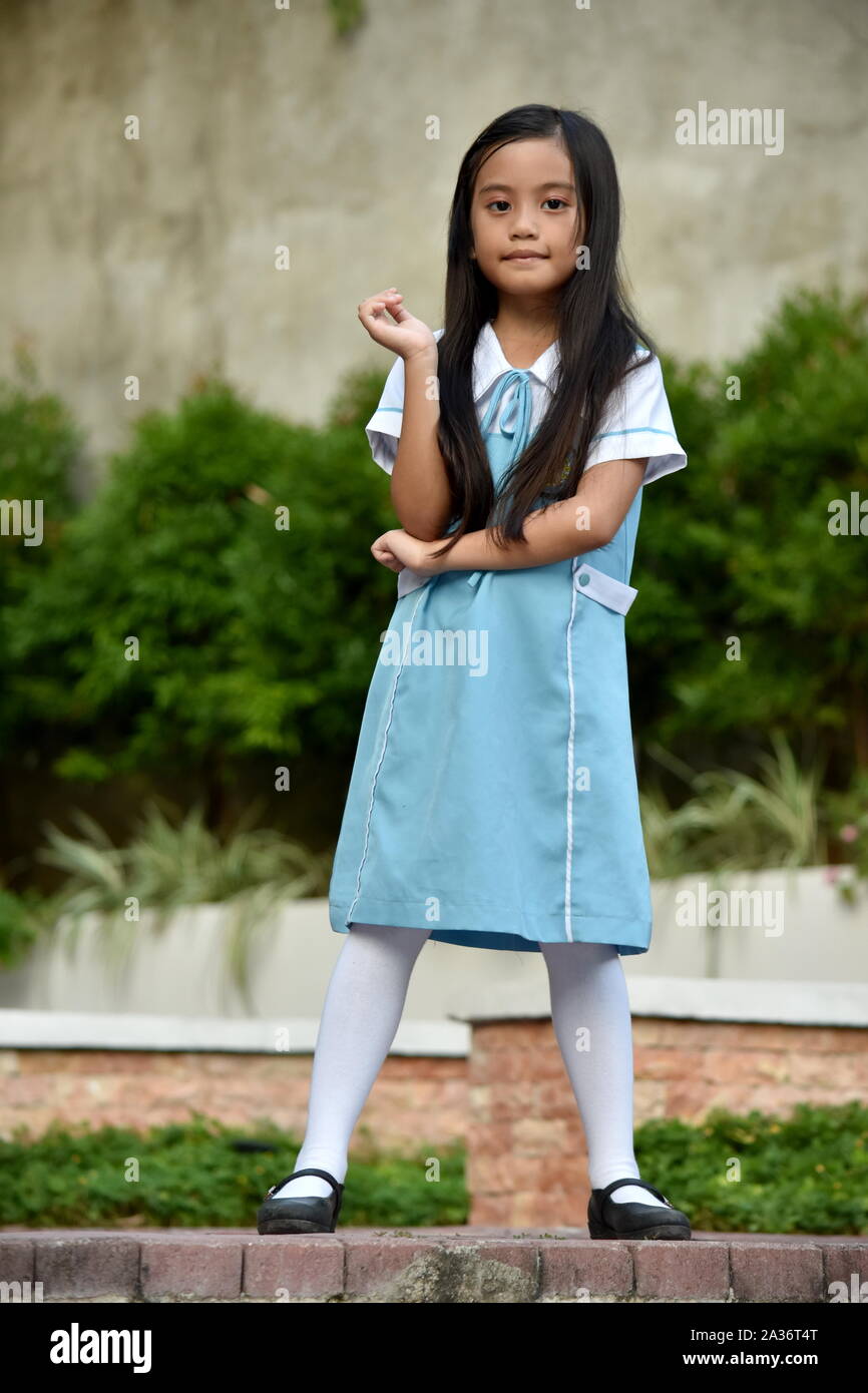 Standing Prep Asian Child Girl Student Stock Photo - Alamy