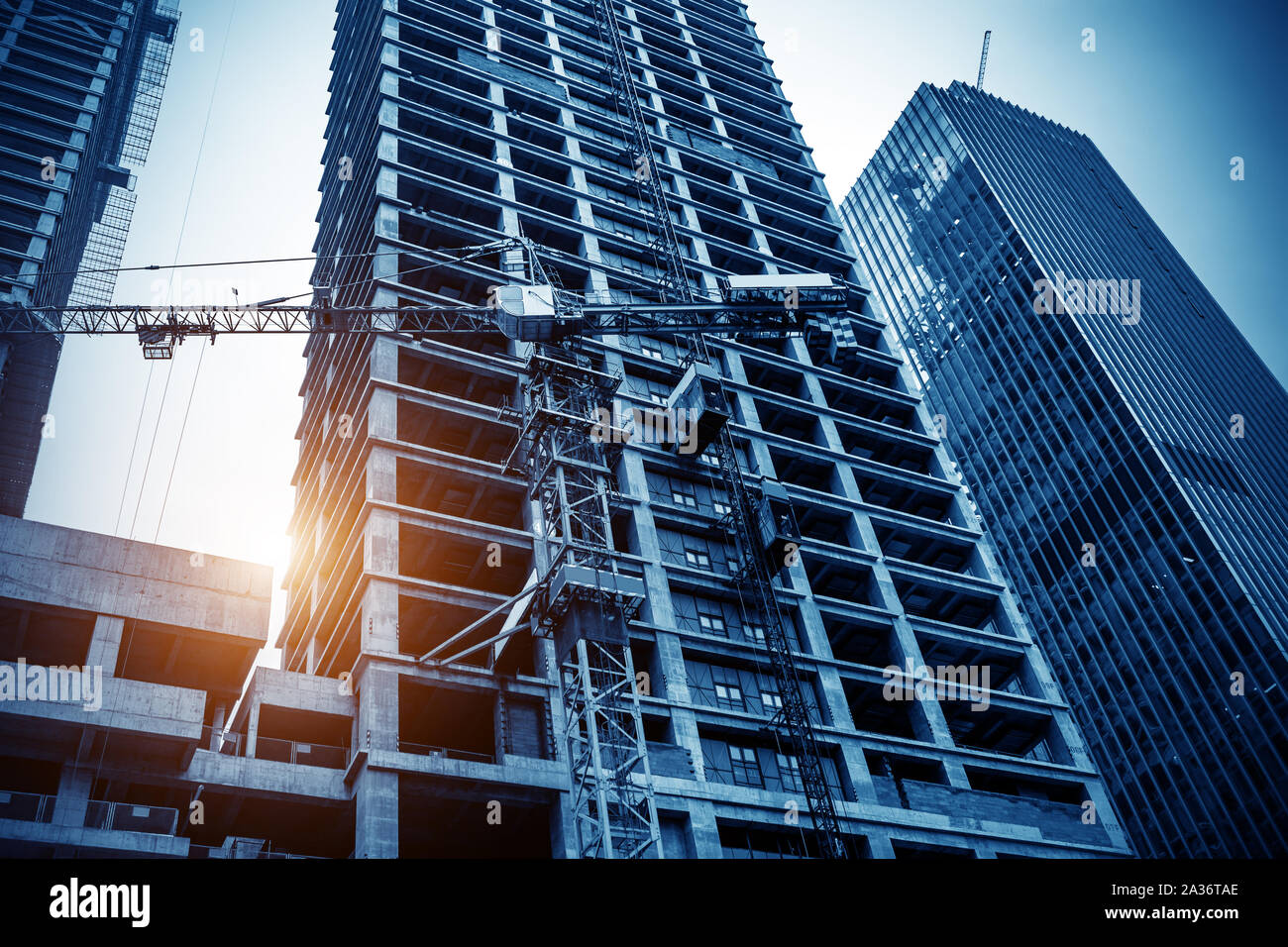Building construction site, tall skyscrapers and cranes Stock Photo - Alamy
