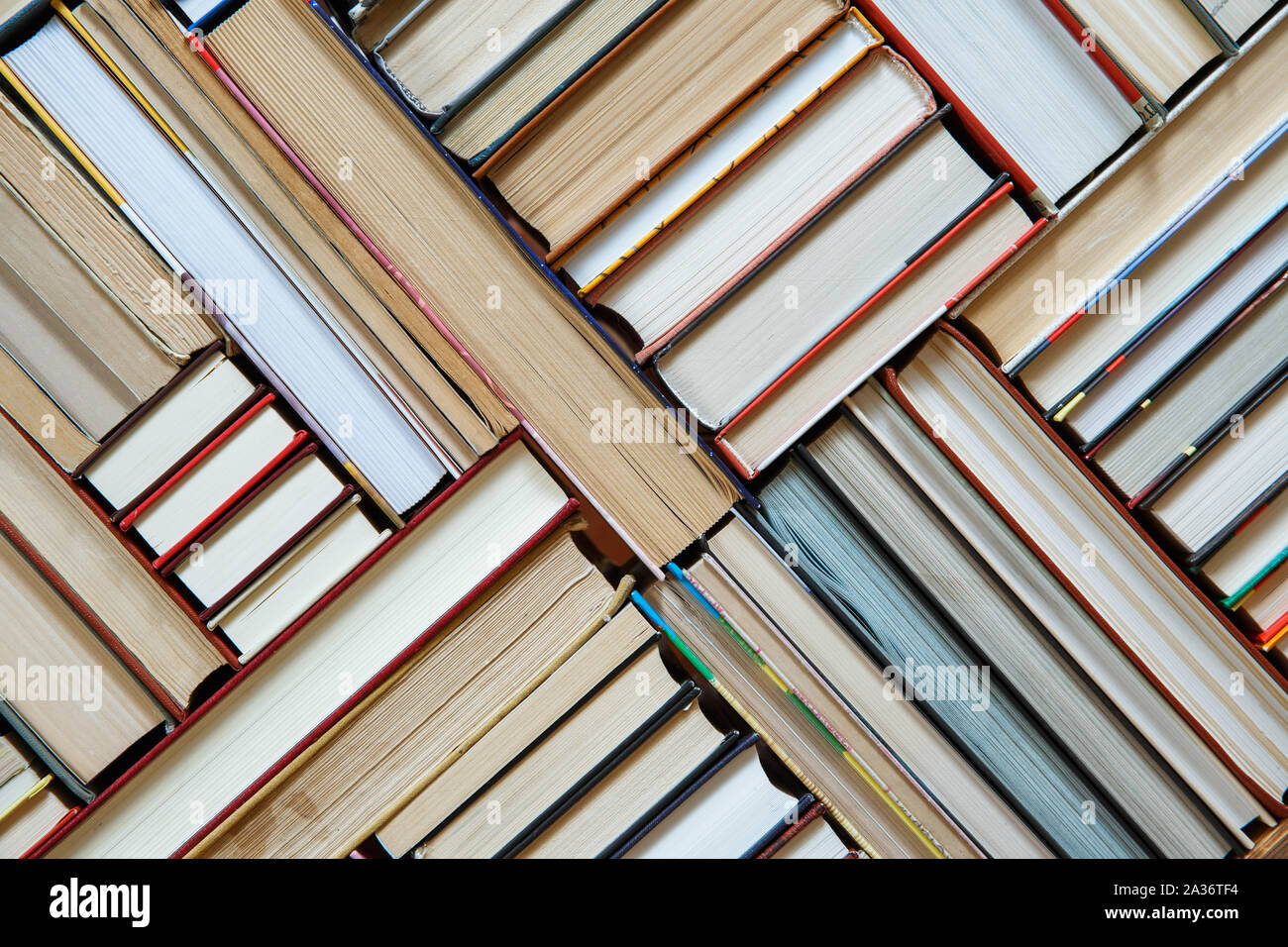 Books stack texture and background Stock Photo - Alamy