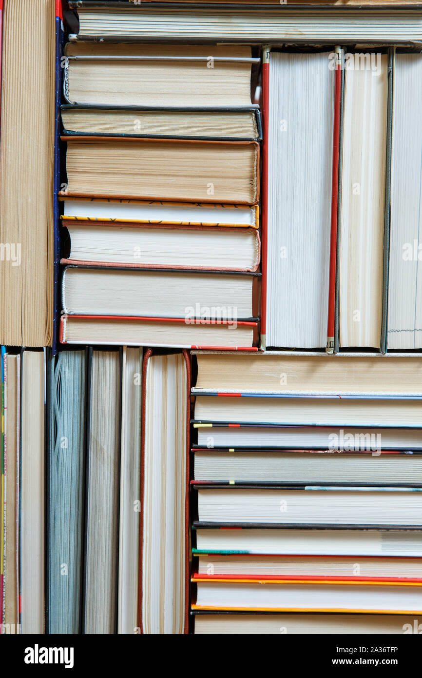 Books stack texture and background Stock Photo - Alamy