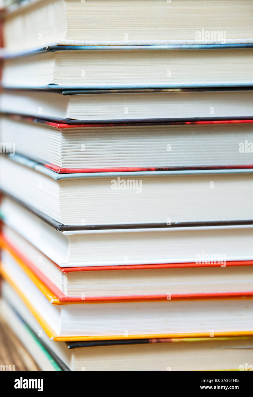 Books stack texture and background Stock Photo - Alamy