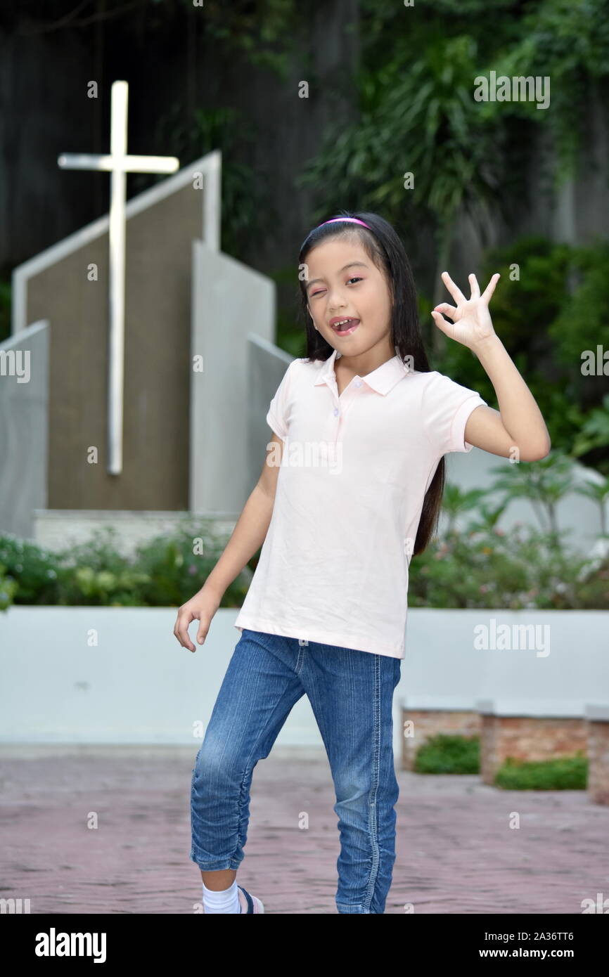 Cute girl with cross hi-res stock photography and images - Alamy