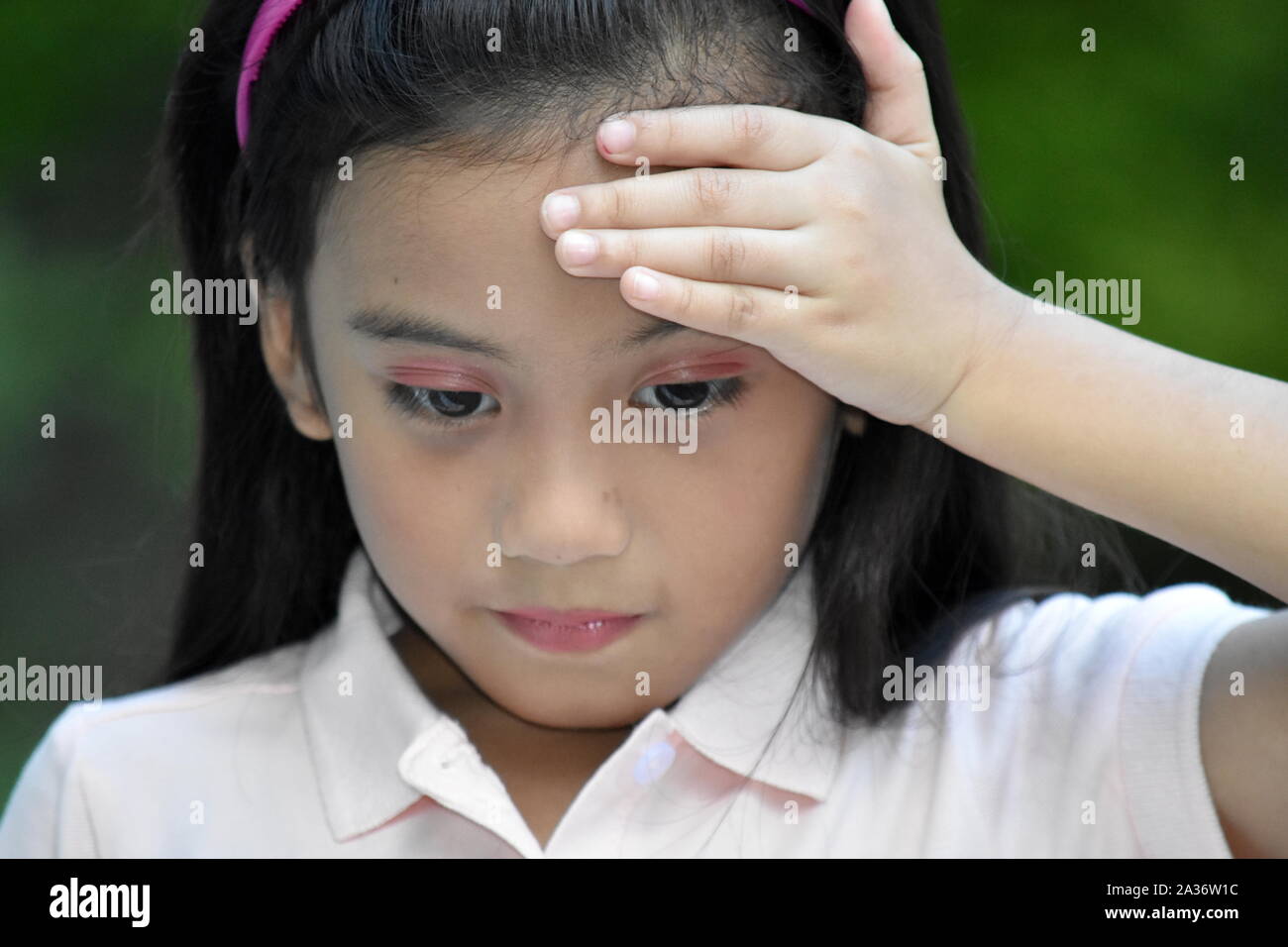 A Cute Female And Worry Stock Photo - Alamy