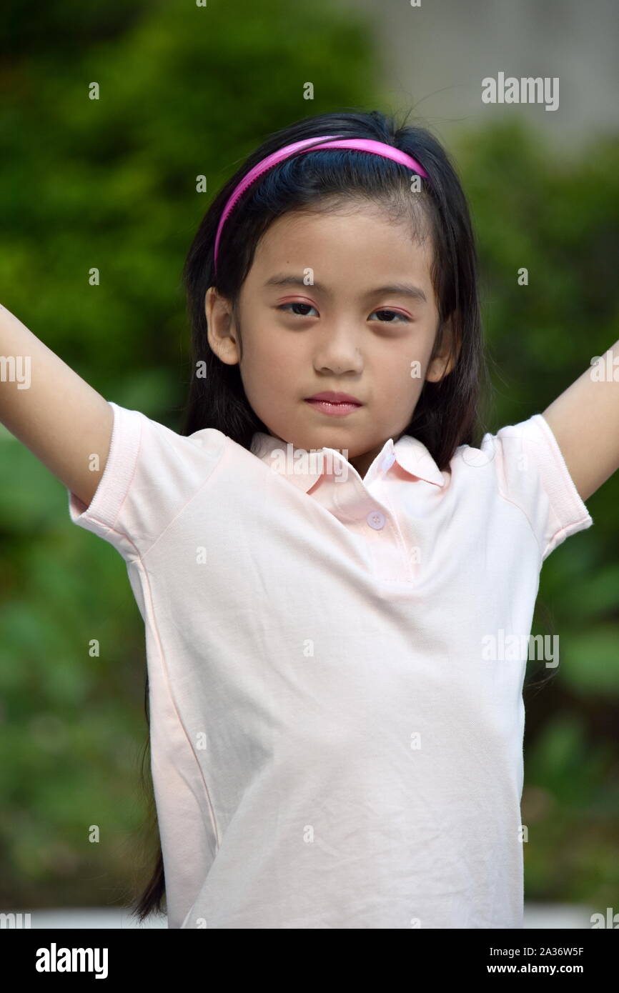 A Cute Filipina Girl And Freedom Stock Photo - Alamy