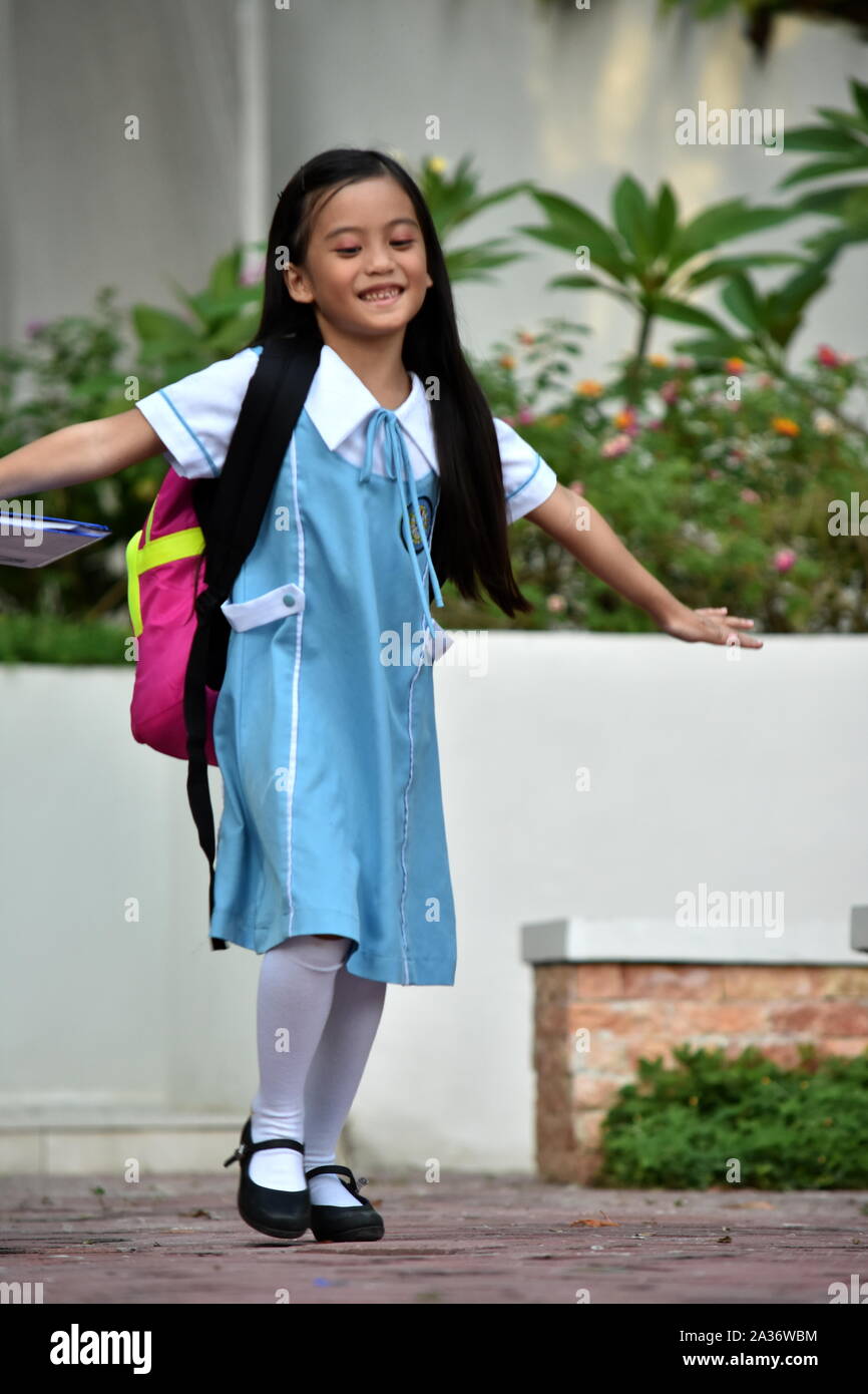 Fun Female Student Wearing School Uniform Stock Photo - Alamy