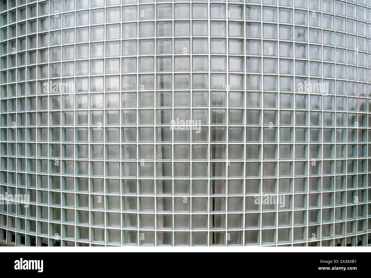 facade of a modern building constructed with glass blocks, curved shape ...