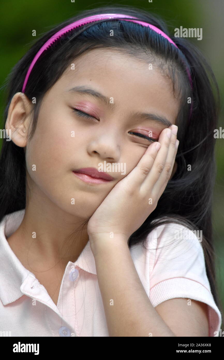 An A Tired Asian Female Stock Photo - Alamy