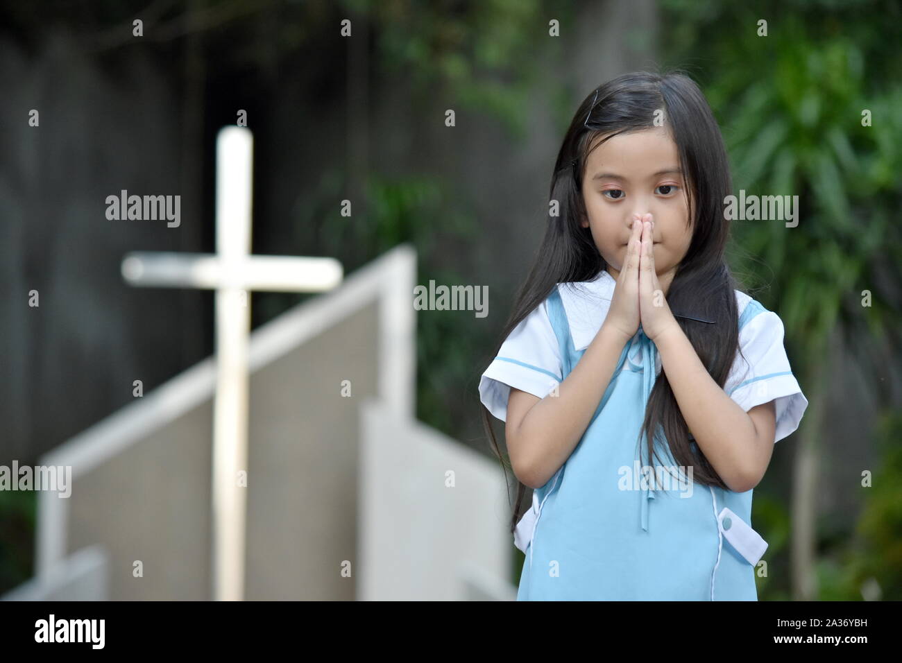 A Praying Spiritual Female At Church Stock Photo - Alamy
