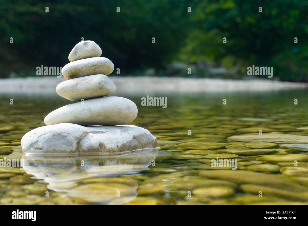 Harmony, balance and simplicity concept. A stone pyramid on the ...