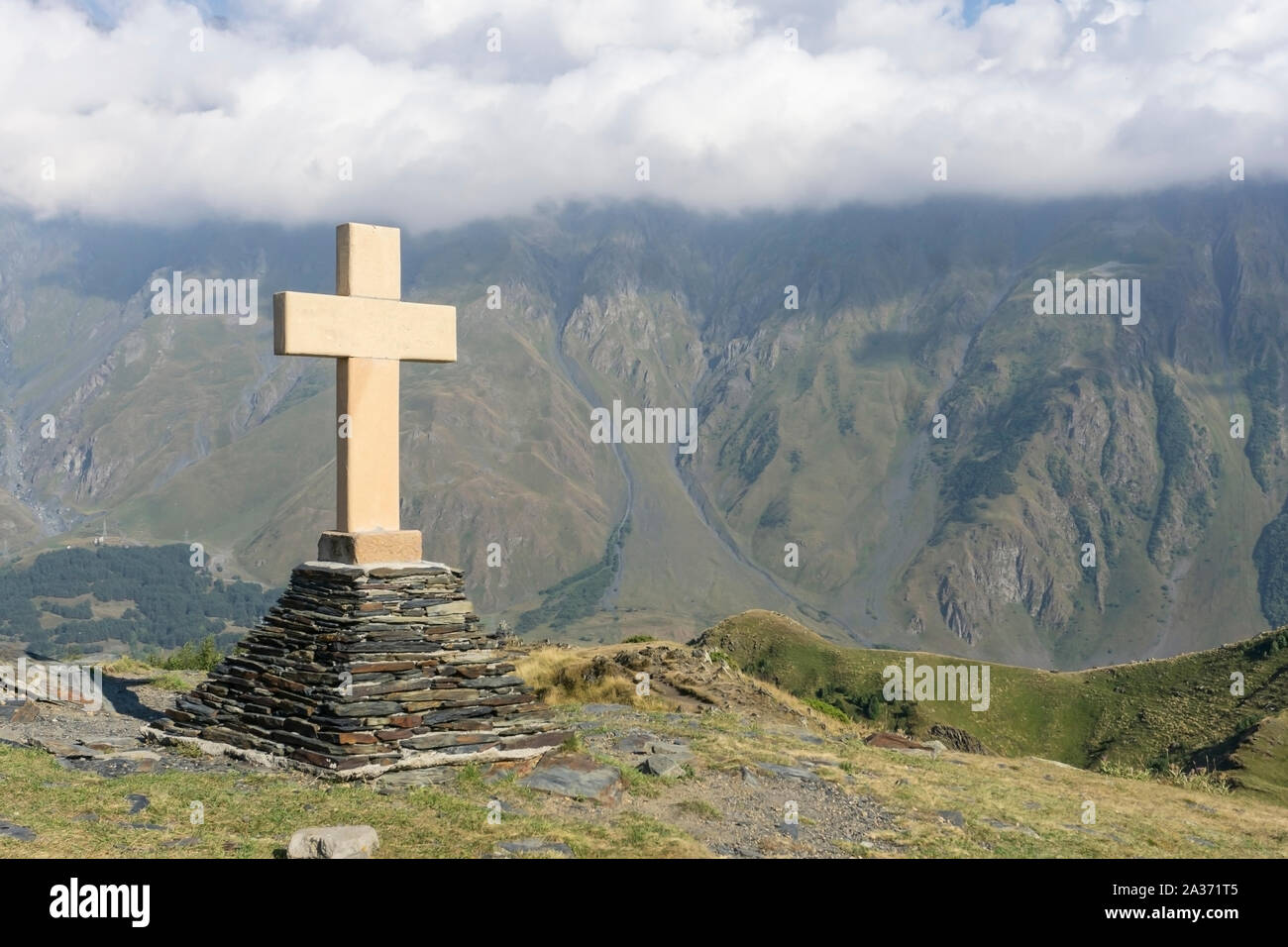Georgia. Ancient Georgian Christian cross on top of a mountain ...