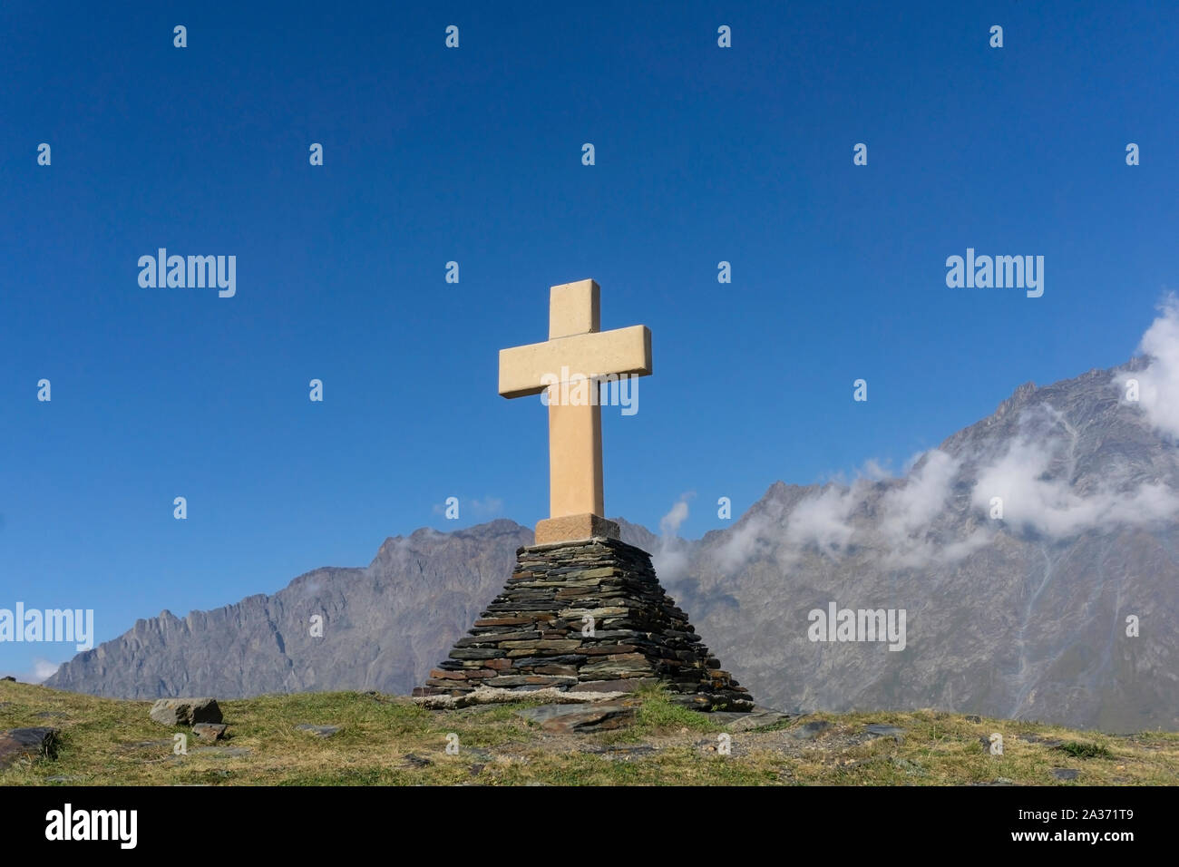 Georgia. Ancient Georgian Christian cross on top of a mountain ...
