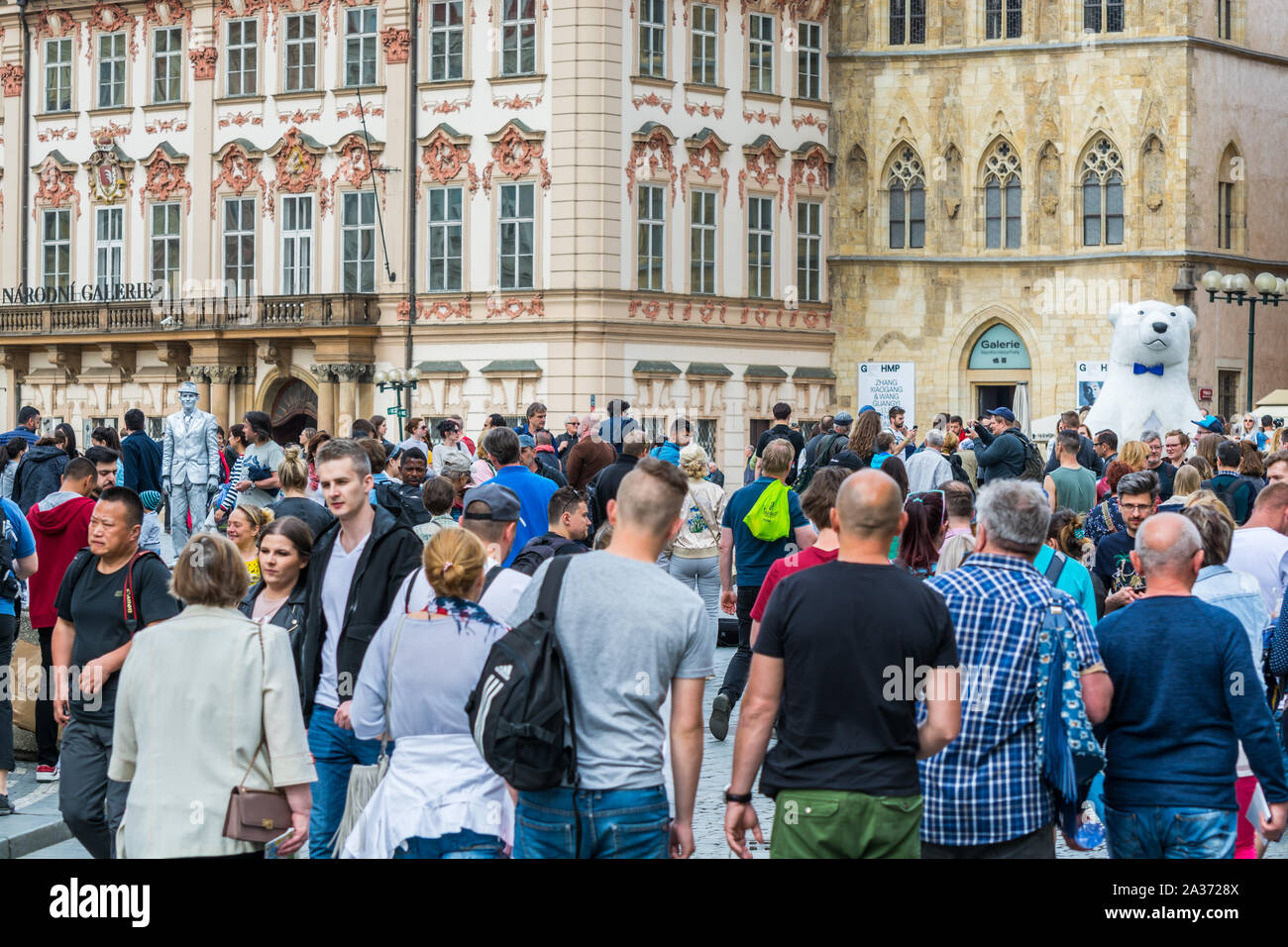 Crowded poeple in the Prague old town square, the oldest and most ...