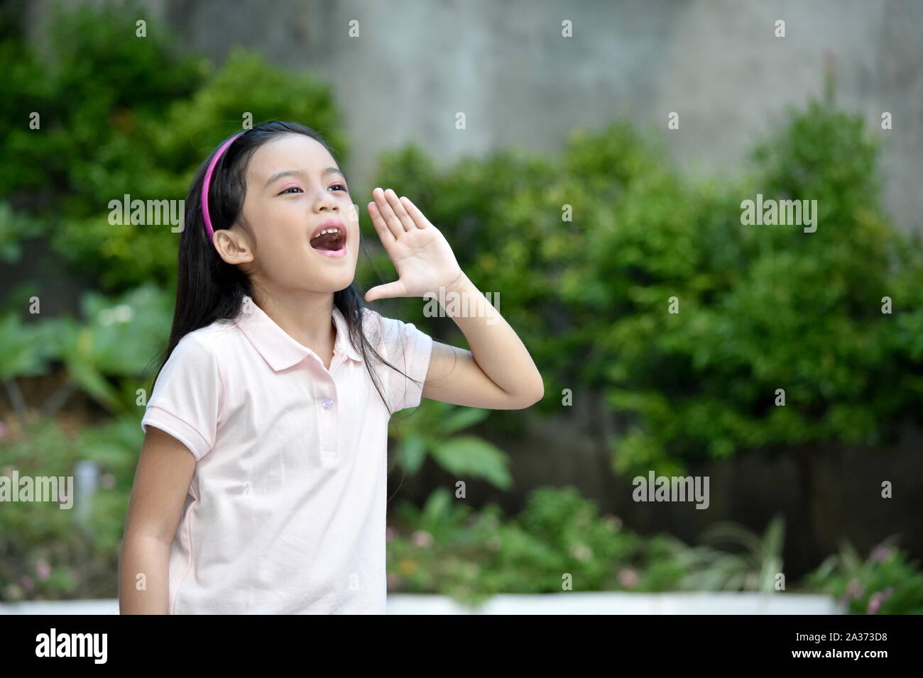 An A Pretty Girl Shouting Stock Photo - Alamy