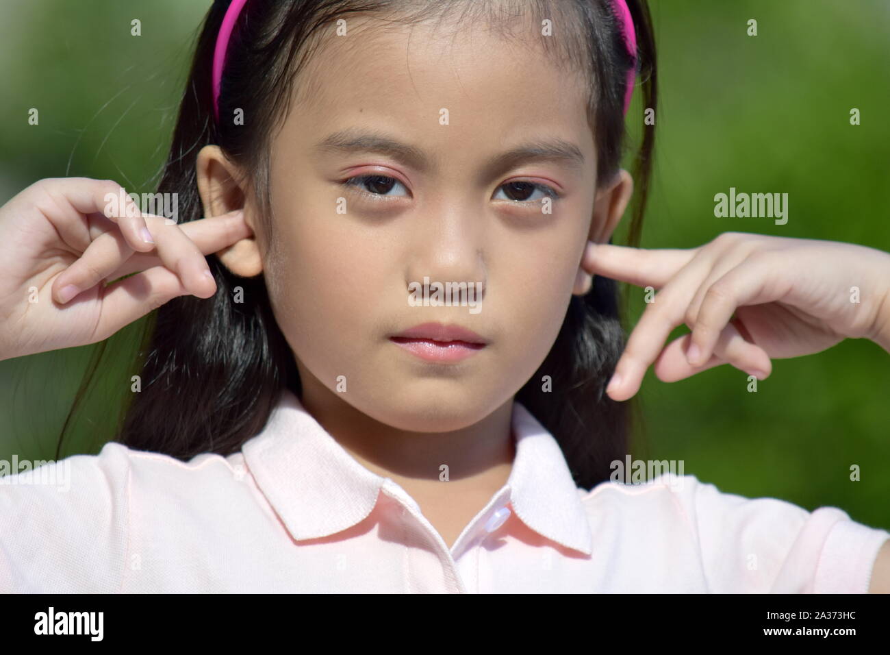 A Silent Petite Filipina Preteen Stock Photo - Alamy