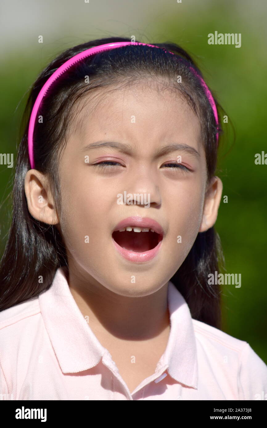 A Stressed Cute Asian Female Stock Photo - Alamy