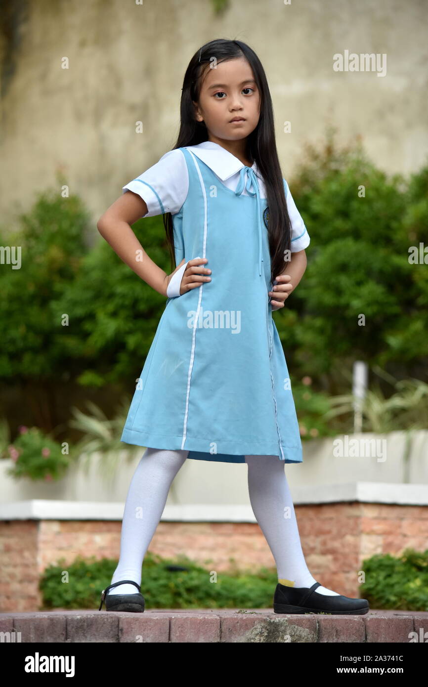 Female Student And Confidence Wearing Uniform Stock Photo - Alamy