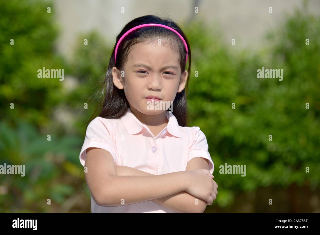 An A Stubborn Girl Child Stock Photo - Alamy