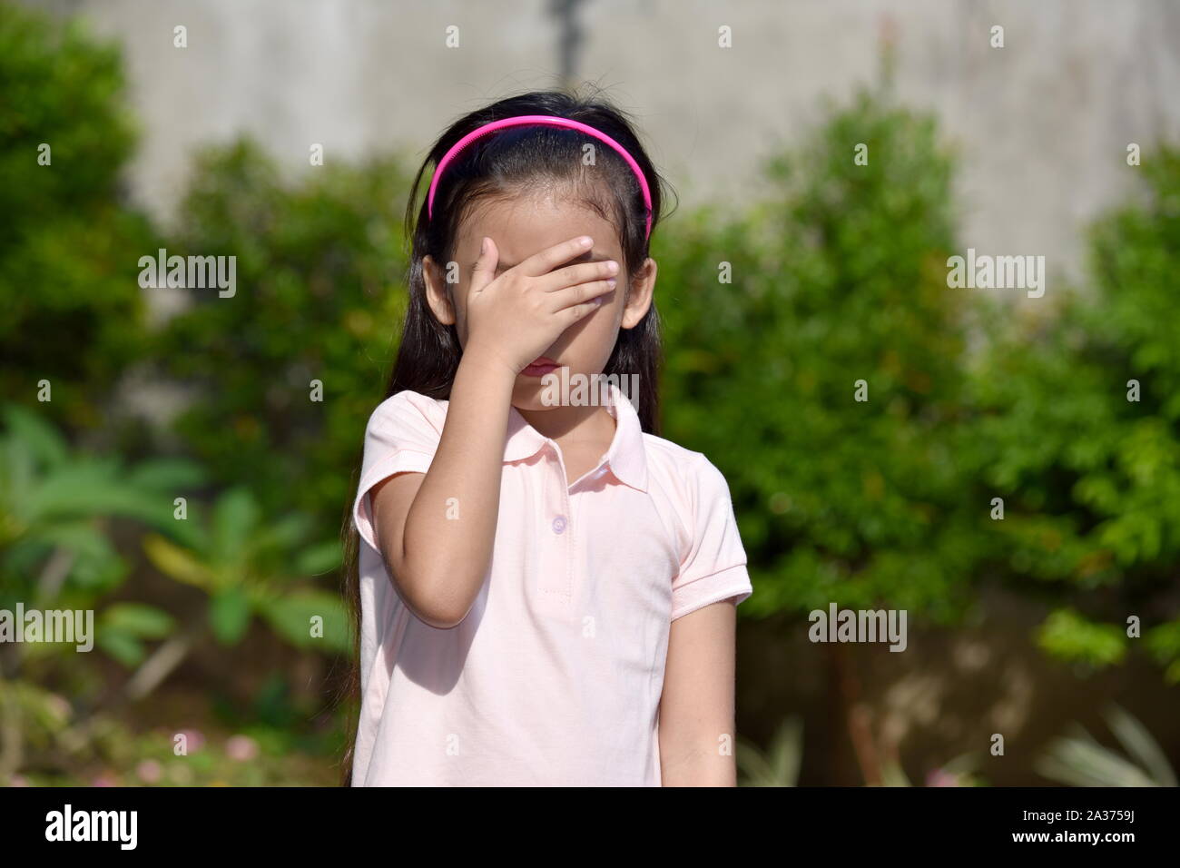 An An Ashamed Girl Youth Stock Photo - Alamy