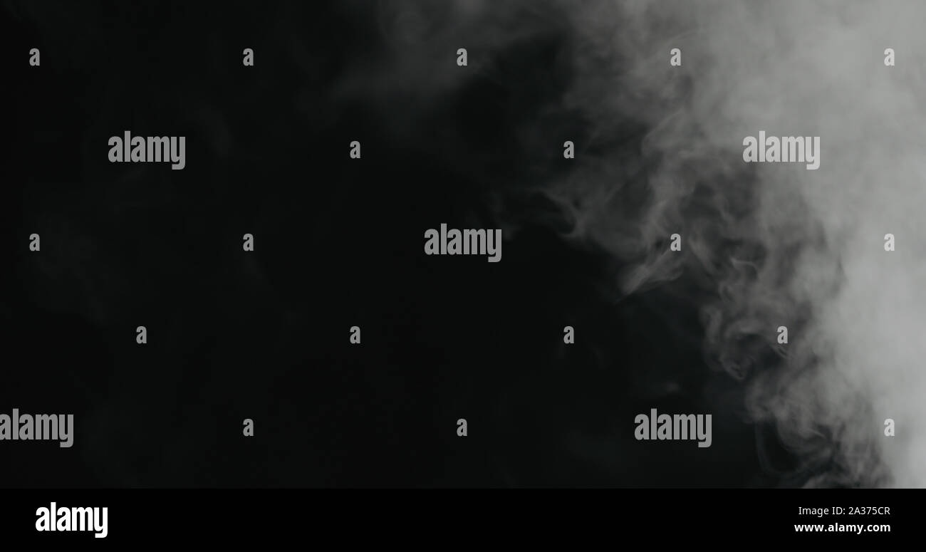 water mist over black background, wide photo Stock Photo - Alamy