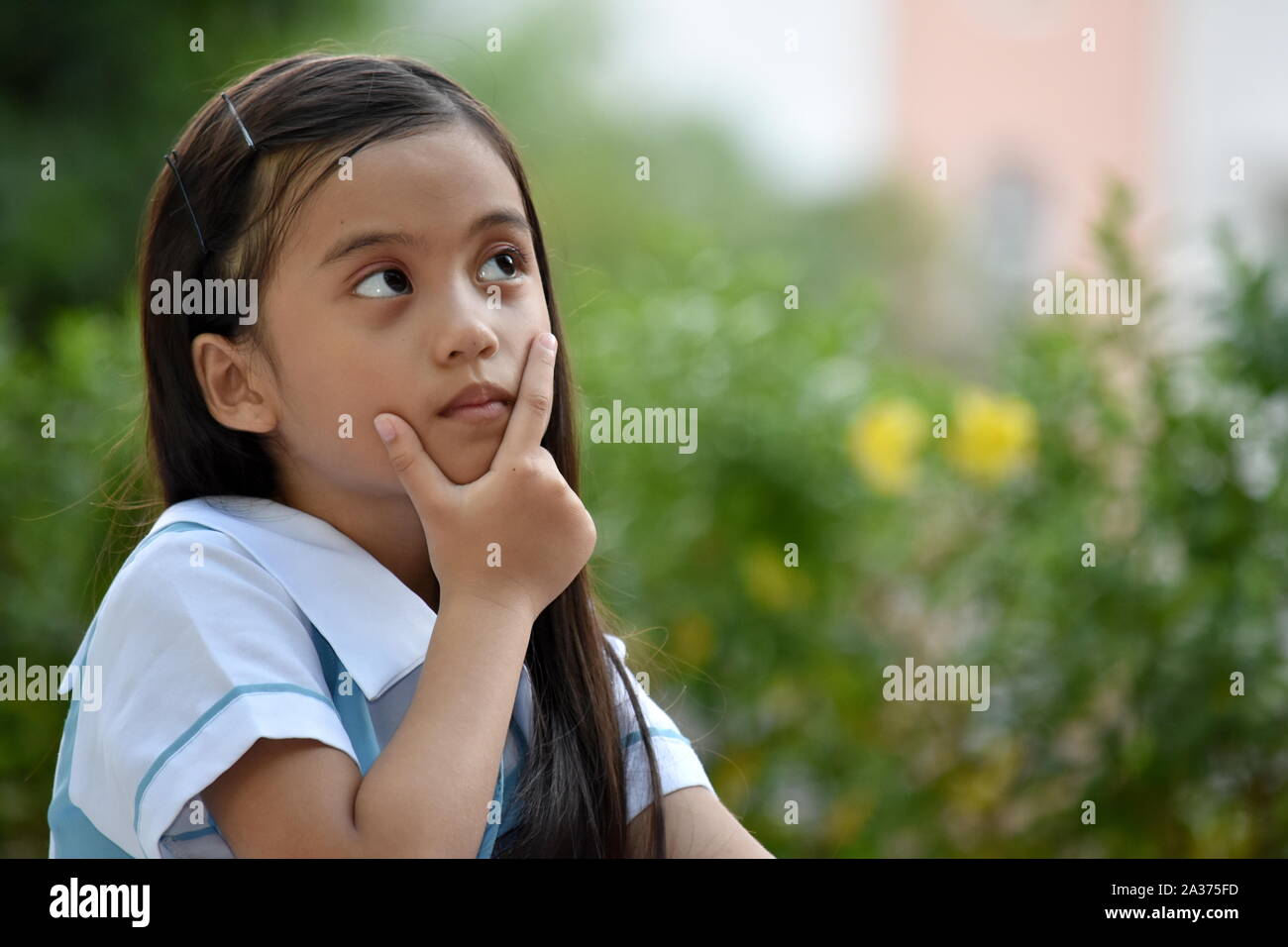 Girl Student Thinking Wearing School Uniform Stock Photo - Alamy
